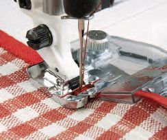 Säädettävä vinonauhan kiinnityslaite – Ompelukonekauppa